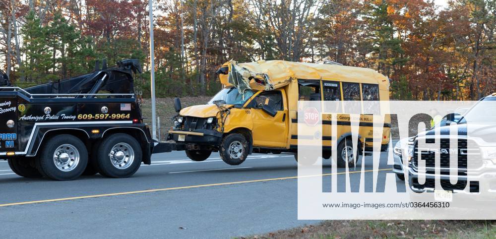 Syndication: Asbury Park Press A St. George School bus is towed away ...