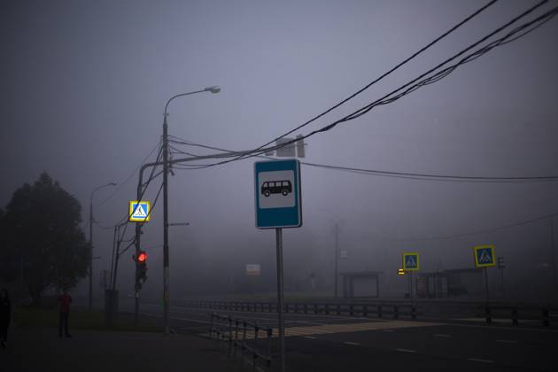 Fog on the road. Fog in the city. Early morning in the city. Moscow ...