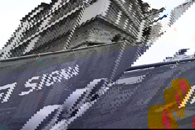 Signa construction site of the investor Rene Benko in Munich fence