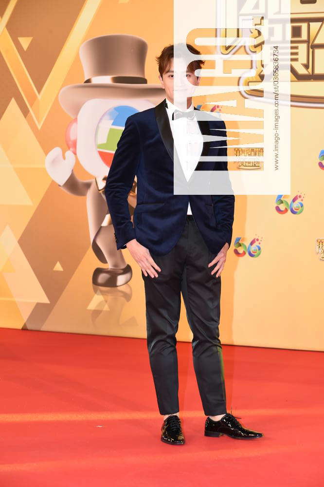 HONG KONG, CHINA - NOVEMBER 19: Actor Edmond Hui poses on the red ...