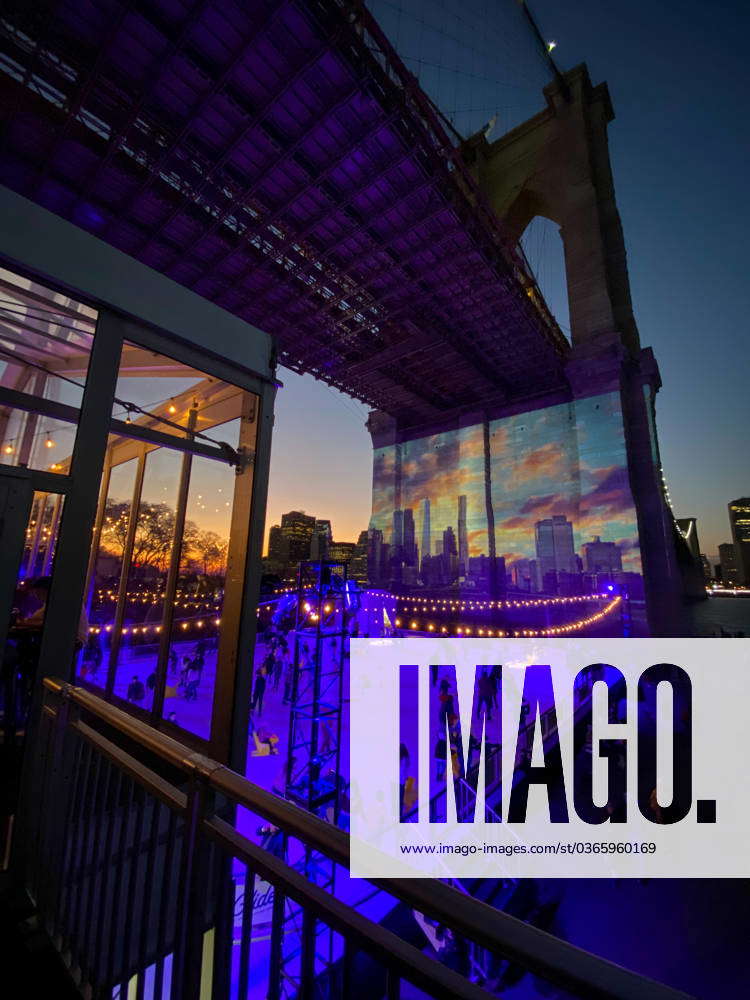 Daily Life in New York City, US - 19 Nov 2023 Skating Ring under the Brooklyn Bridge in Dumbo in