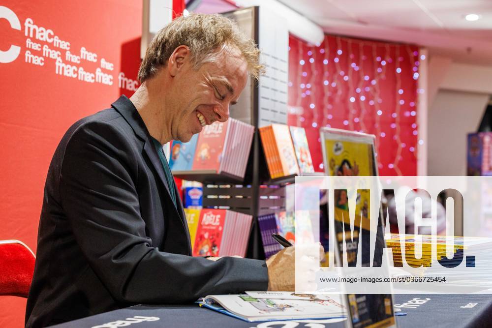 Delaf Signs Copies Of New Gaston Lagaffe - Paris Canadian comic strip ...