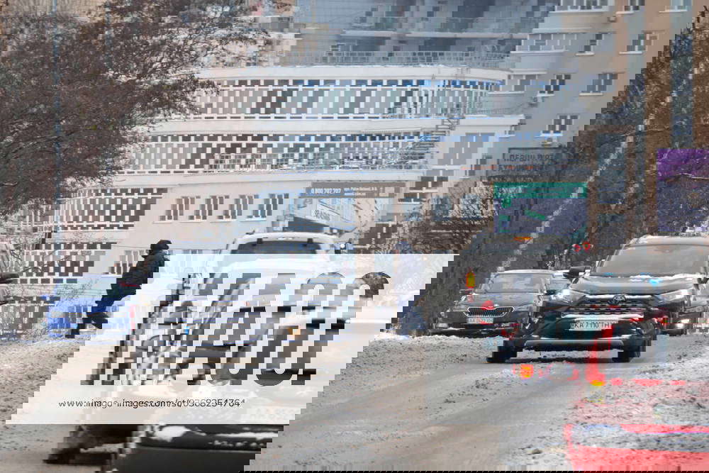 Snowfall in Kyiv A pedestrian is crossing a street in Kyiv, Ukraine, on ...