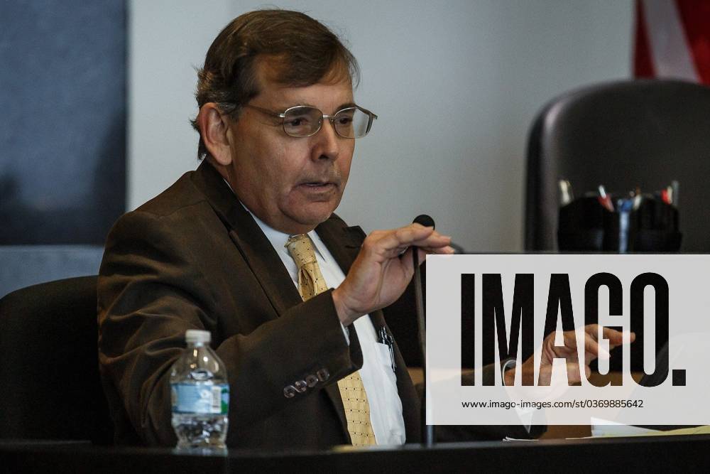 Syndication: Palm Beach Post, Dr. Adam White testifies in Judge Dahlia ...