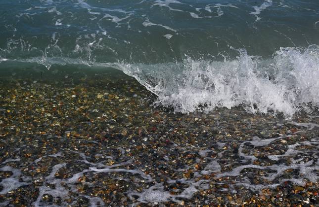 COASTAL STOCK, Stock image of waves washing across pebbles on a beach ...