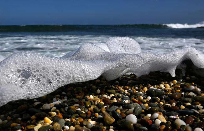 COASTAL STOCK, Stock image of waves washing across pebbles on a beach ...