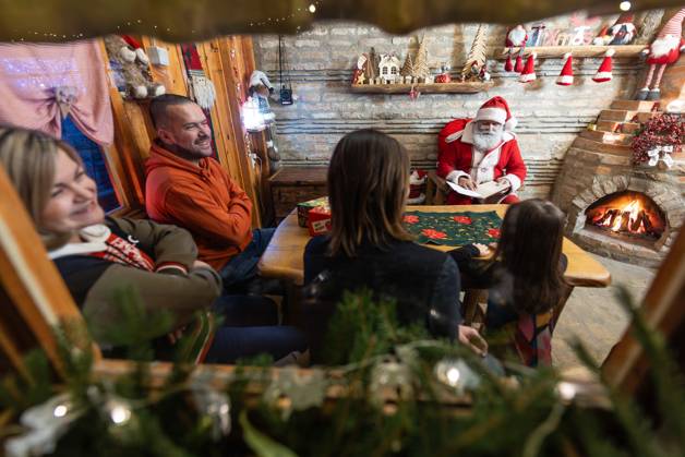 Croatia Santa Clause Zeljko Matagic dressed as Santa Claus gives a ...