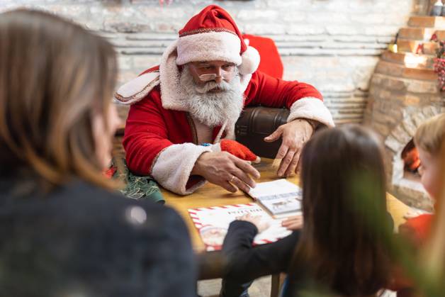 Croatia Santa Clause Zeljko Matagic dressed as Santa Claus gives a ...