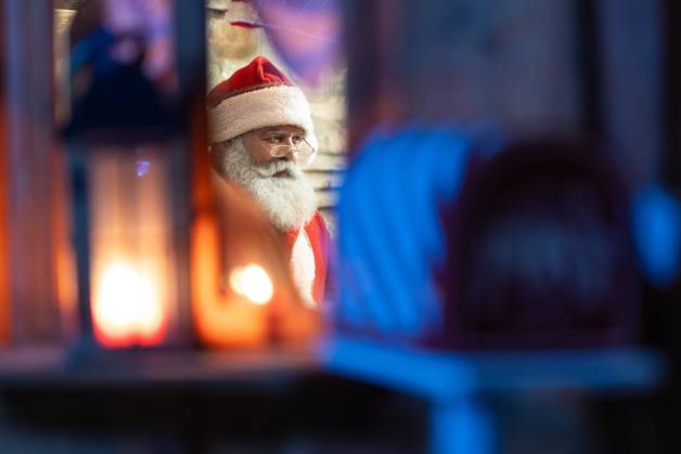 Croatia Santa Clause Zeljko Matagic dressed as Santa Claus gives a ...