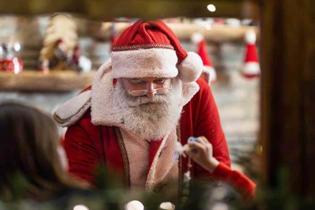 Croatia Santa Clause Zeljko Matagic dressed as Santa Claus gives a ...