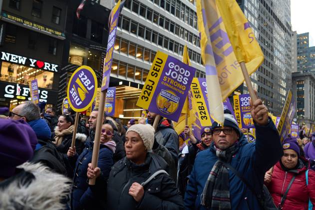 New York, New York, USA: Members of the 32BJ union rally to authorize a ...
