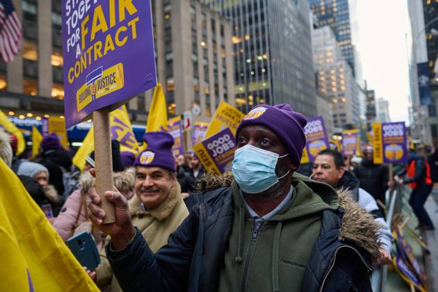 New York, New York, USA: Members of the 32BJ union rally to authorize a ...