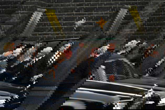 FRANCO COZZO FUNERAL, Mourners gather at the conclusion of the funeral ...