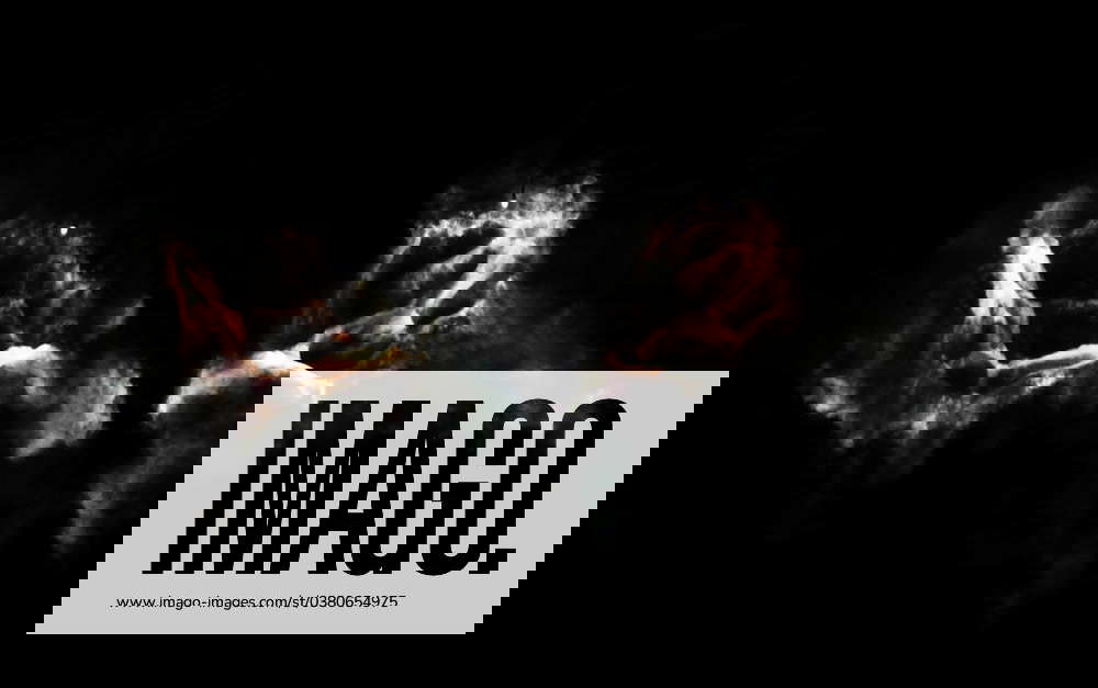 Stage separation occurs as a SpaceX Falcon Heavy rocket launches the ...