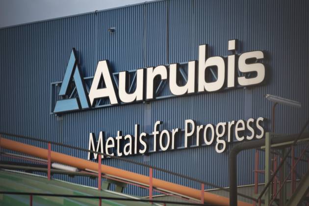 Logo and Logo Aurubis Metal for Progress to a Factory floor at Work the ...