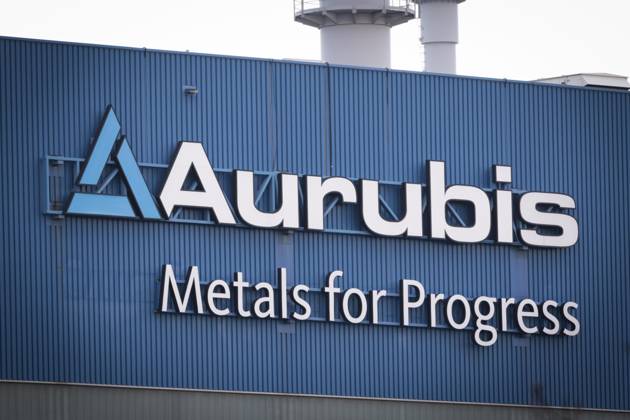 Logo and Logo Aurubis Metal for Progress to a Factory floor at Work the ...