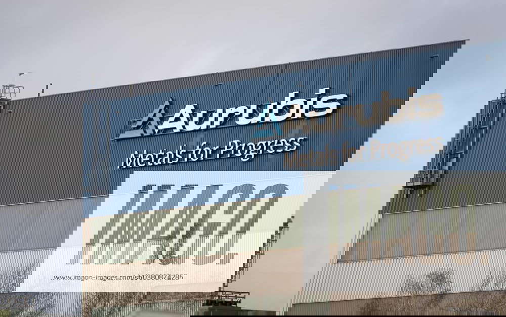 Logo and Logo Aurubis Metal for Progress to a Factory floor at Work the Aurubis AG, Industrial