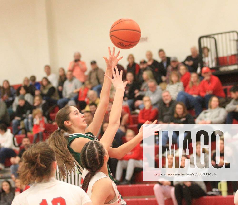 Syndication: The Advocate Northridge s Ava Travis shoots from the paint ...