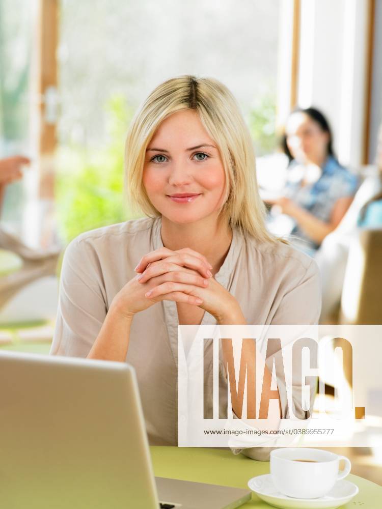 Woman Using Laptop In