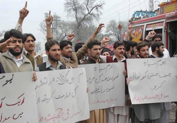 Activists of Islami Jamiat Tulba chant slogans against America during a ...
