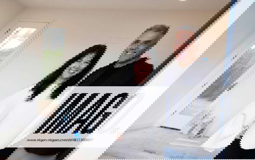 Syndication: Arizona Republic Ted and Genine Telepak stand inside their ...