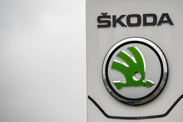 Skoda logo and lettering in front of a car dealership 04 02 2024 ...