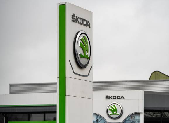 Skoda logo and lettering in front of a car dealership 04 02 2024 ...