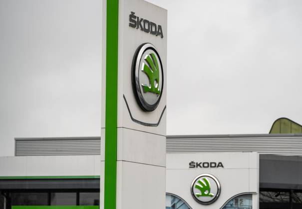 Skoda logo and lettering in front of a car dealership 04 02 2024 ...