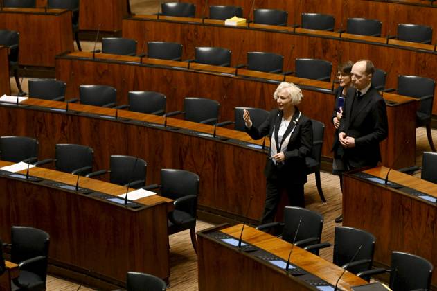 The Speaker of the Finnish Parliament Jussi Halla-aho (R) leads his ...