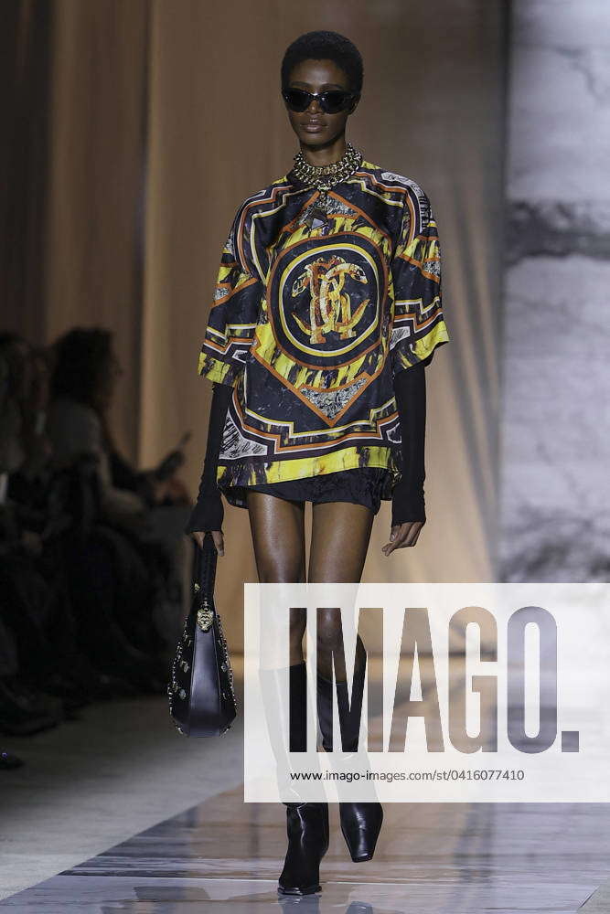 MFW - Roberto Cavalli Runway A model walks the runway at Roberto ...