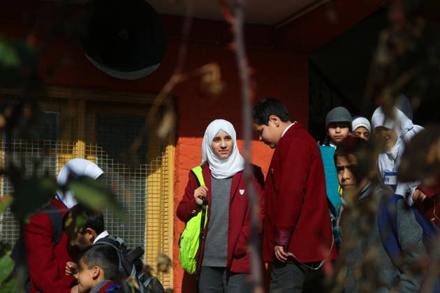 Back To School In Kashmir - India Students arrive the school during the ...