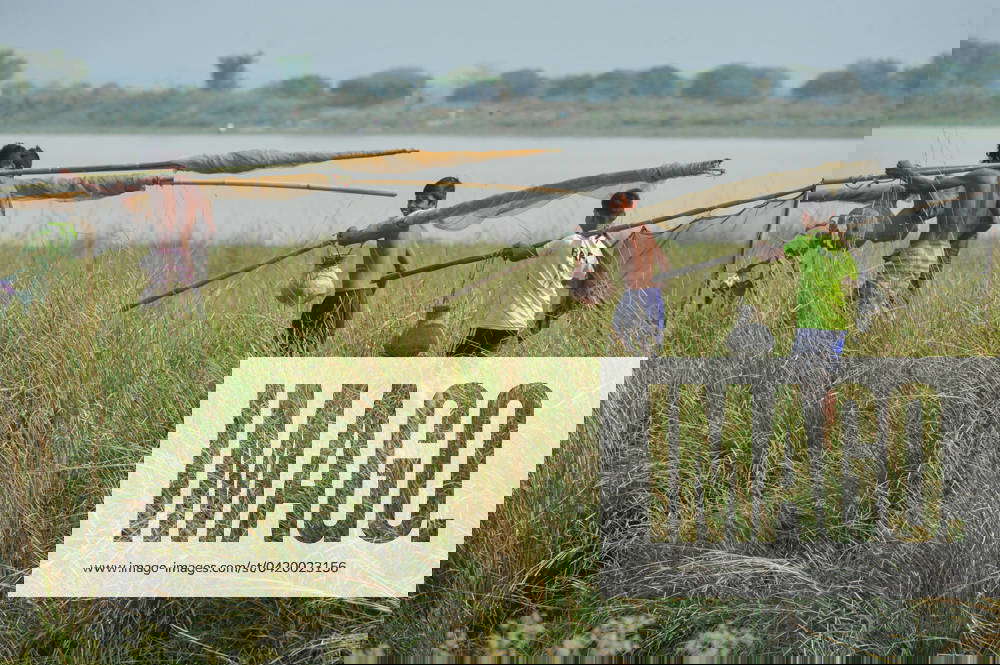 : Rural People going to take part on traditional fishing with Net and ...