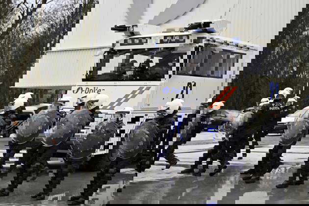 Policemen in action during intervention exercises during a royal visit ...