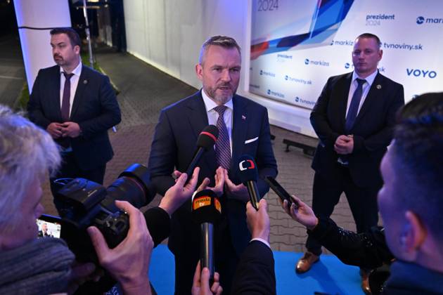 Slovak presidential candidate Peter Pellegrini speaks to journalists as ...