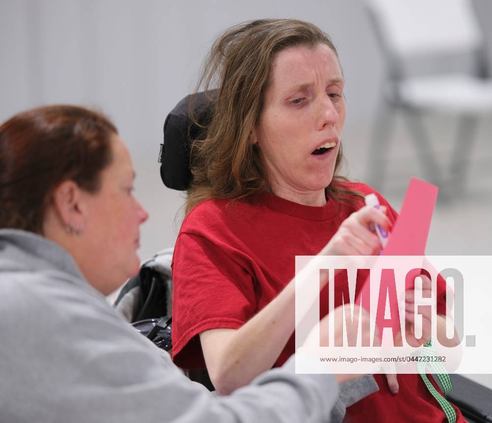 Syndication: The Oklahoman April Reeves, left, assists Sherry W. in ...