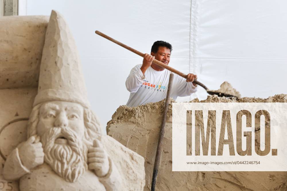 March 25, 2024, Florida, USA: Sand sculptor Kumpa Tawornprom, of Safety ...