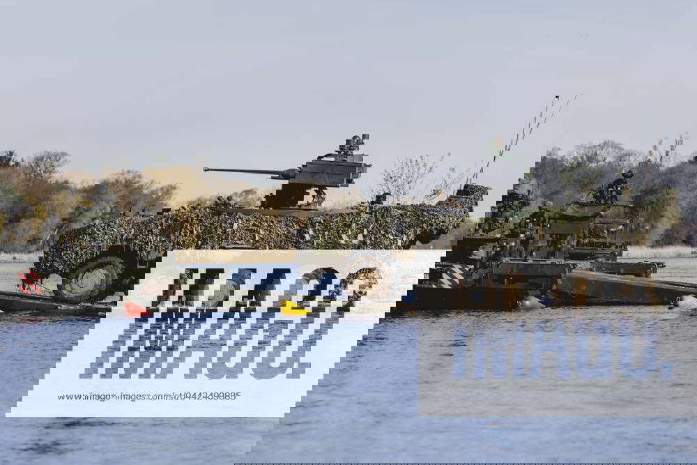 A Pandur II tank navigates the Bundeswehrs Amphibie M3 floating bridge ...
