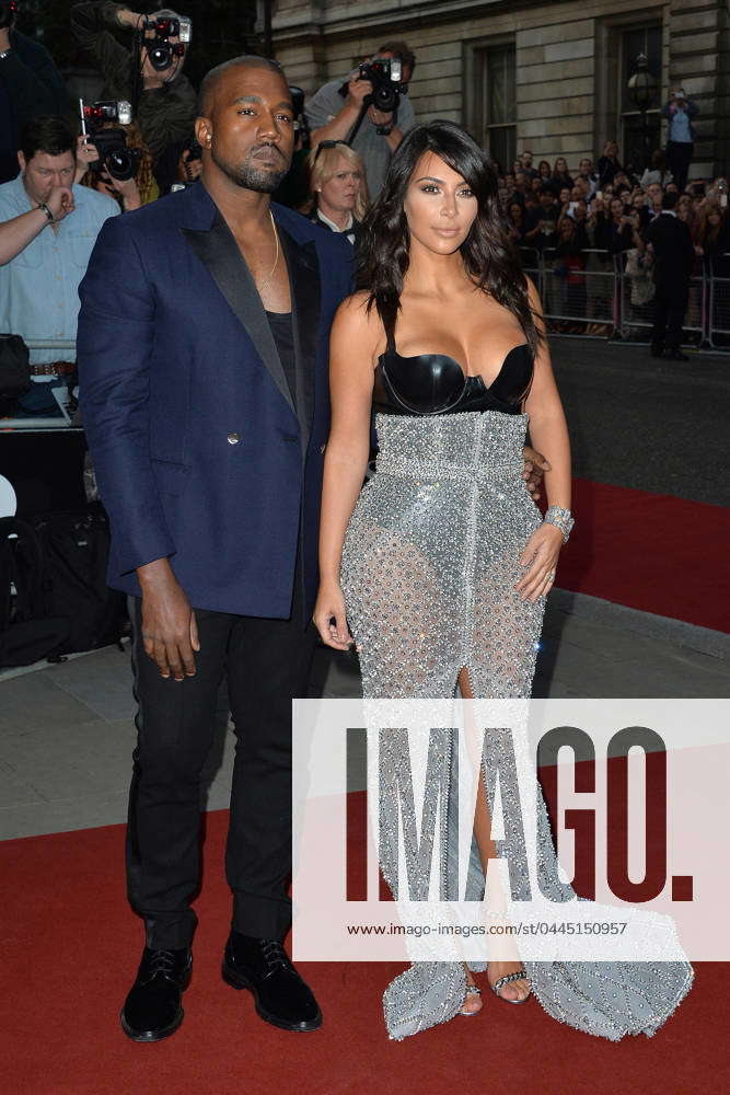 Kanye West and Kim Kardashian at the GQ Men of the Year Awards at Royal ...