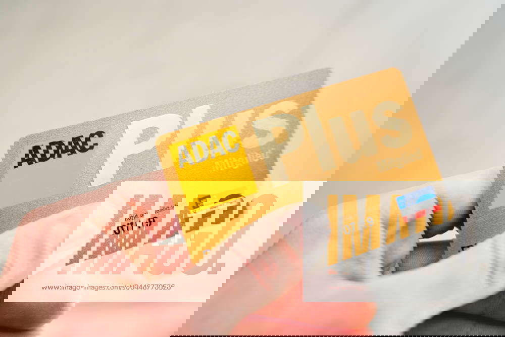 Augsburg, Bavaria, Germany - : Hand holding an ADAC membership card ...