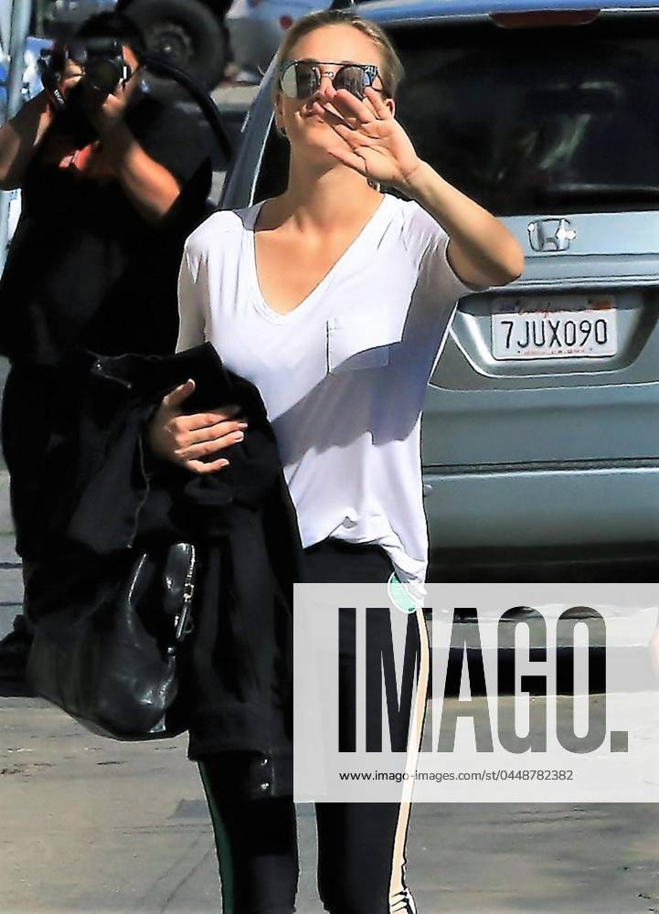 Kaley Cuoco wears a pair of Givenchy sport sandals to complete her ...