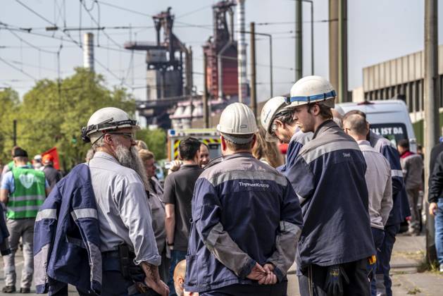 Steelworkers at a demonstration in front of the headquarters of ...