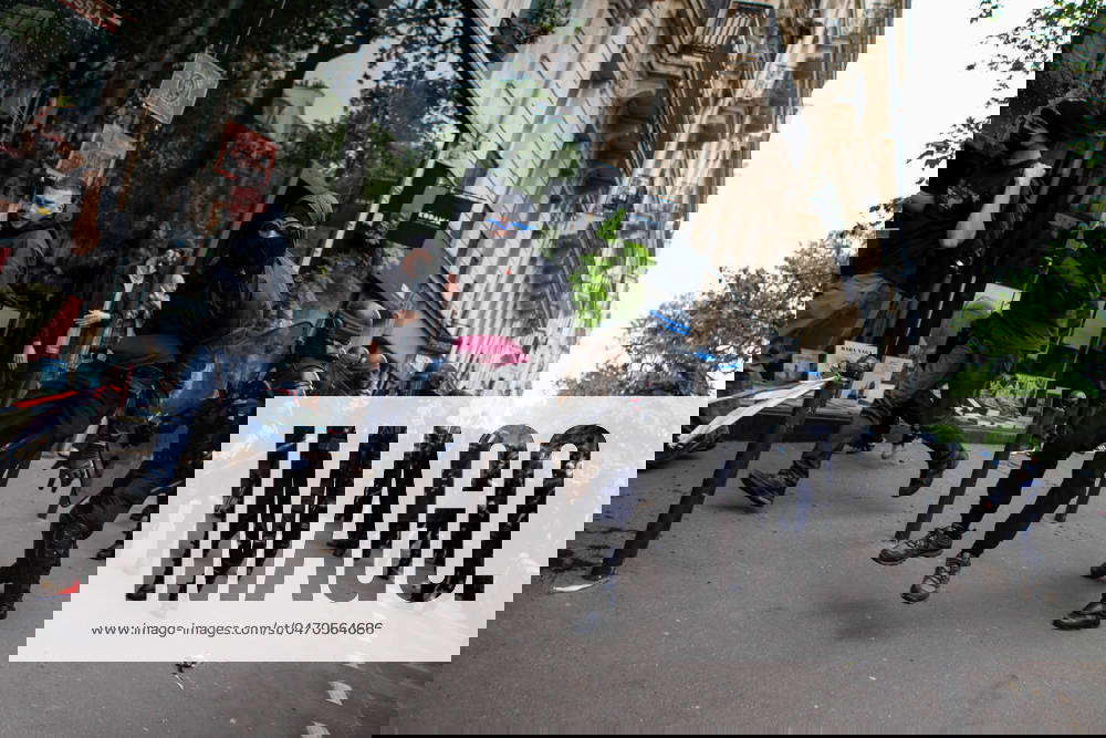 Anit-Capitalists protest in Paris. A protester flees as riot police ...