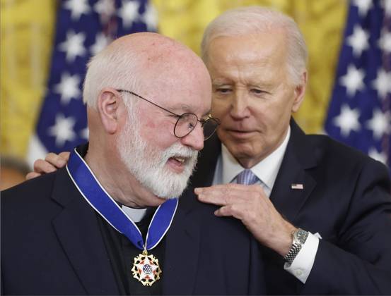 President Joe Biden presents Father Greg Boyle with the Presidential ...