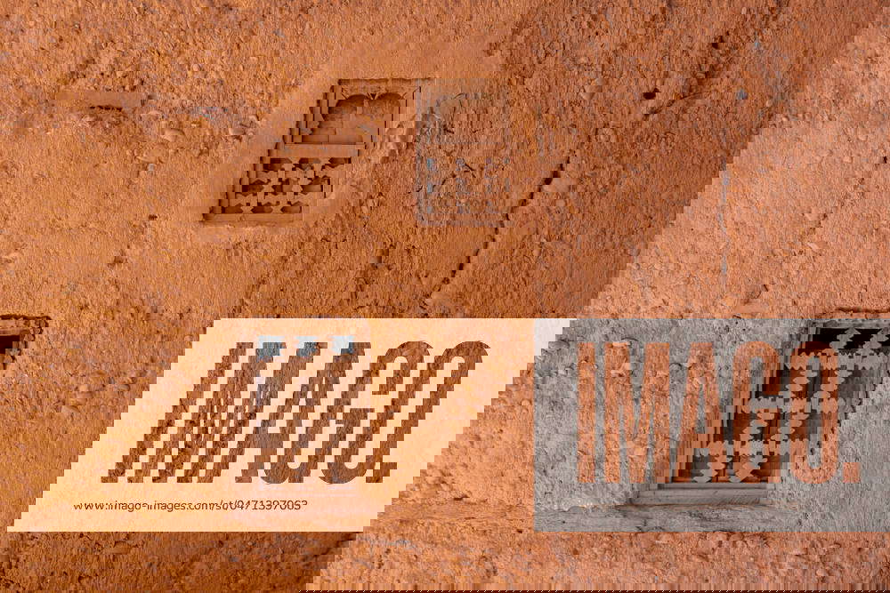 Two little windows in a typical berber house built of clay Two little ...