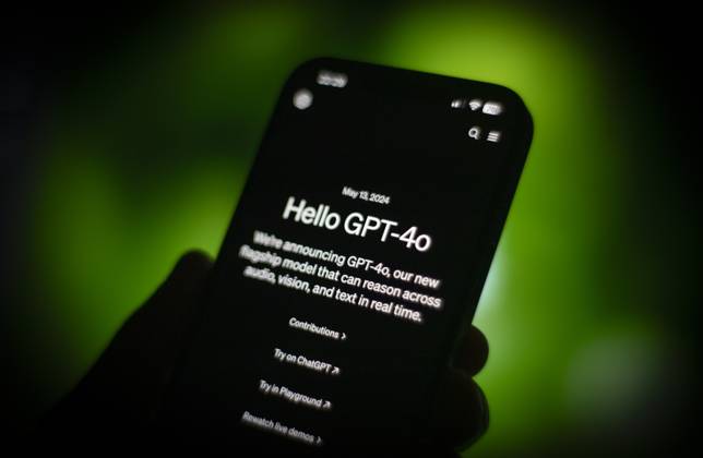 OpenAI Introduces New AI Model Called GPT 4o The ChatGPT app is seen on a mobile device in this