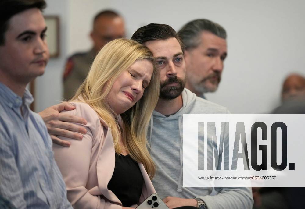 Syndication: Austin American-Statesman Kaitlyn Kash is comforted by ...