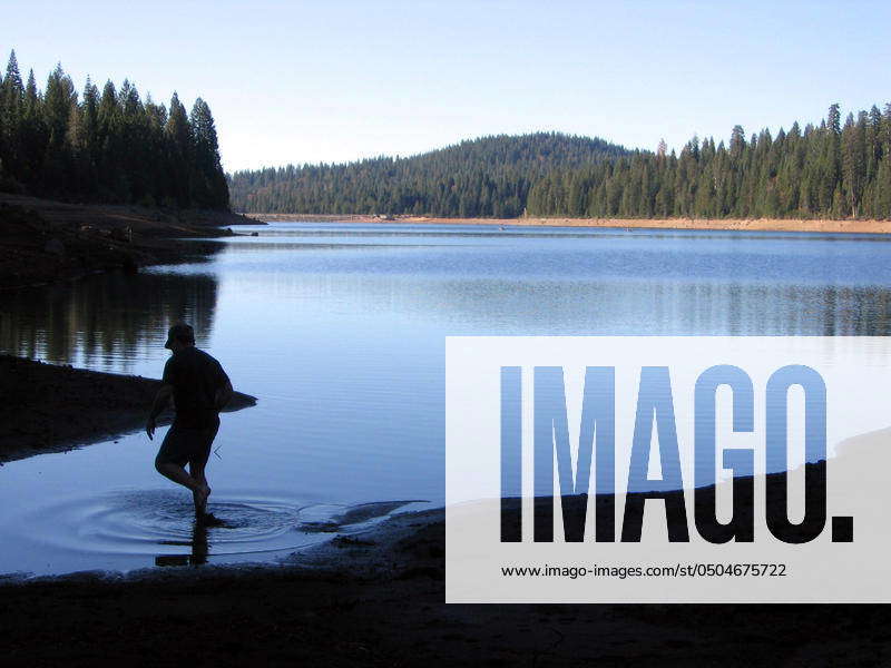 Bigfoot A lone searcher passes through Stumpy Meadows Lake in El Dorado ...