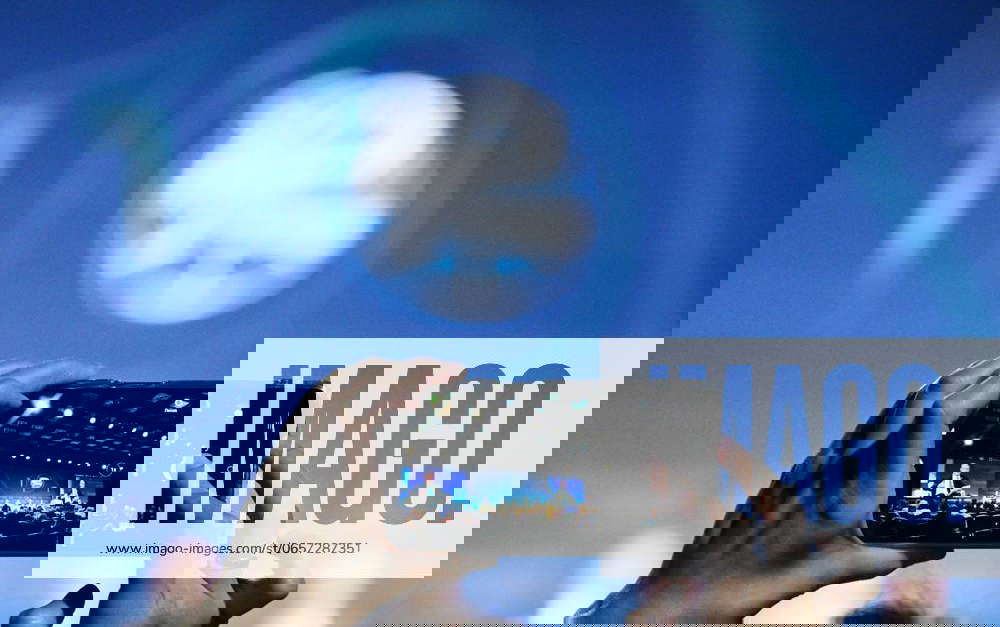 Russia Primakov Readings Forum 8715993 25.06.2024 A woman uses her mobile phone during the 10th