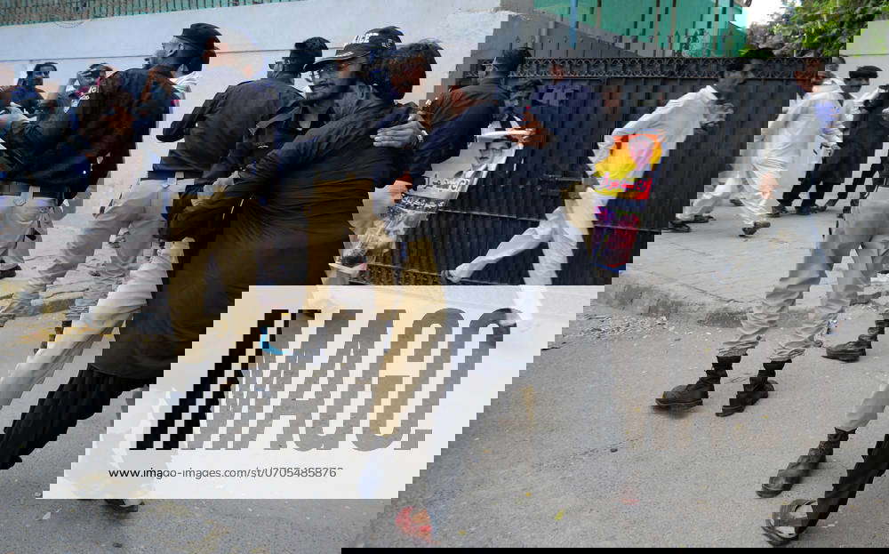 KARACHI, PAKISTAN, JUL 03: Police officials barricade protesters when ...