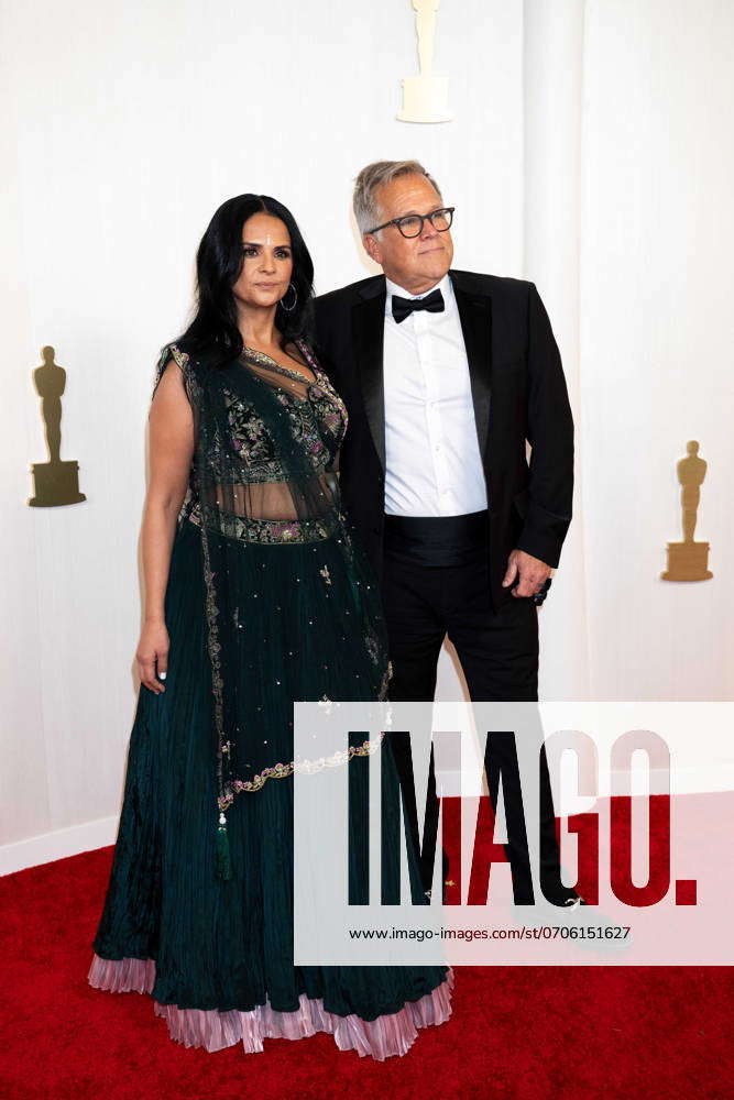 96th Oscars, Academy Awards Doug Prochilo and Bela Bajaria arrive on ...